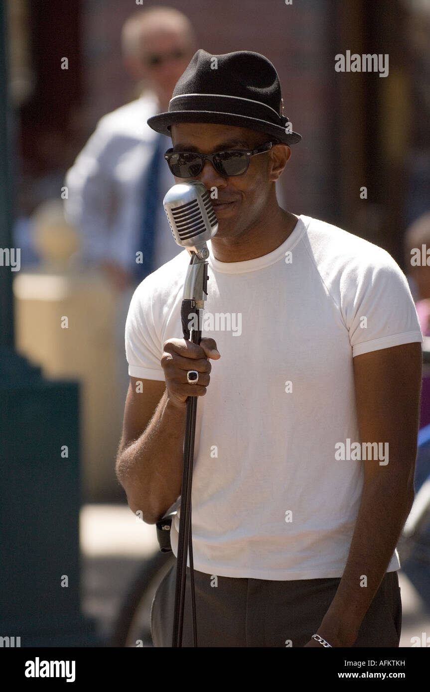 Singer street performer Stock Photo - Alamy