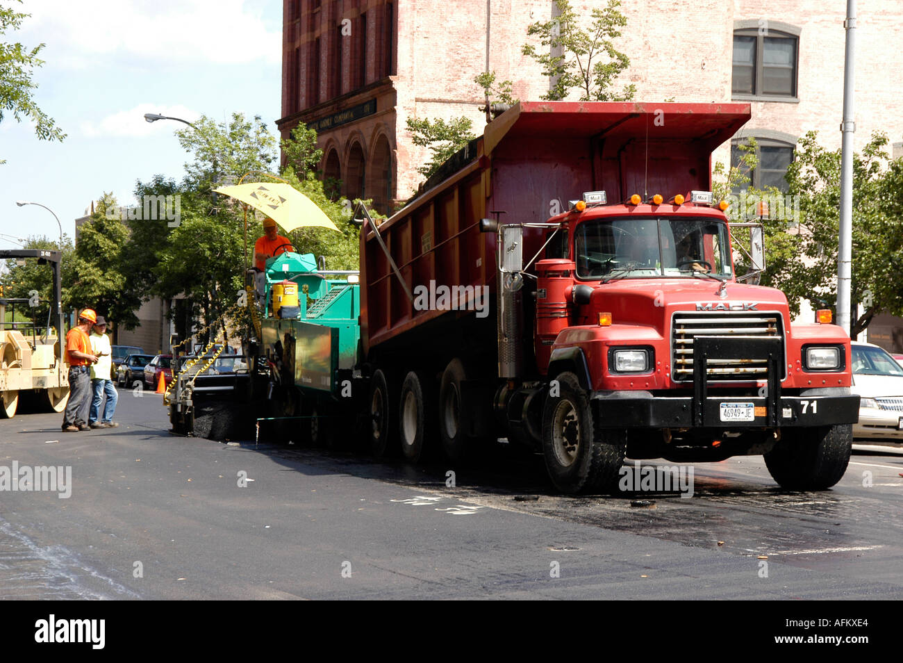 Road paving crew Rochester NY USA Stock Photo - Alamy