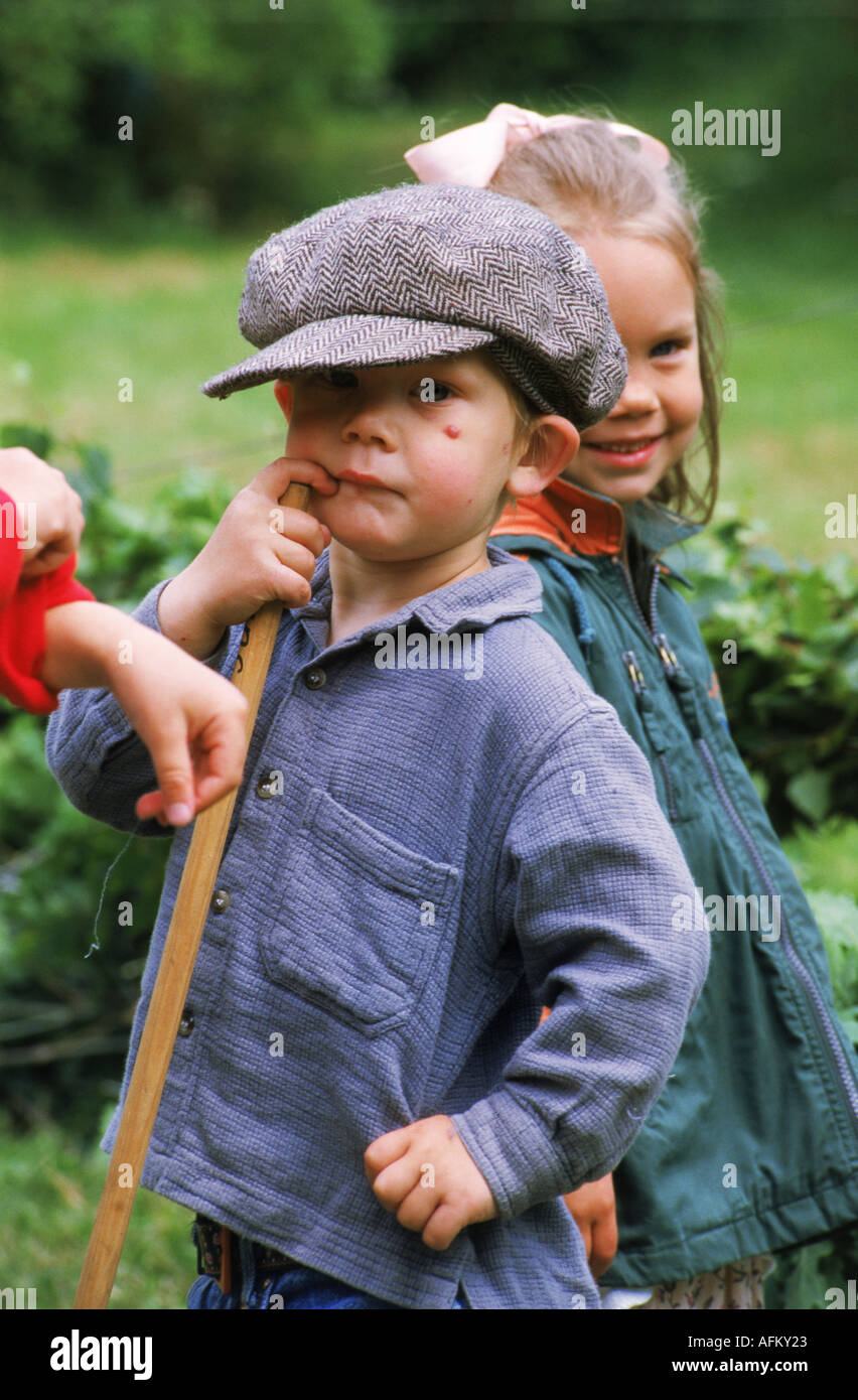 Boy with hat outside hi-res stock photography and images - Alamy