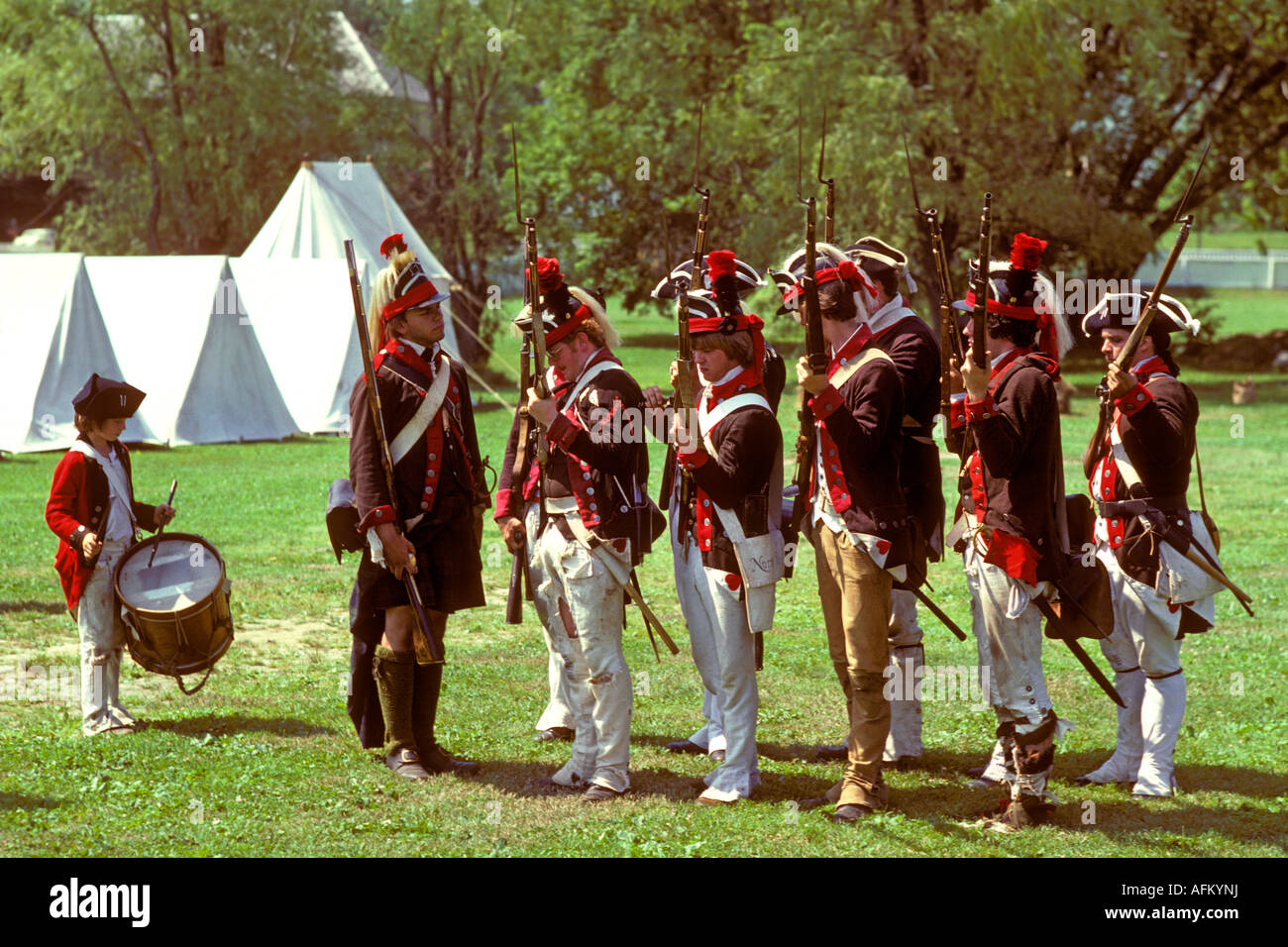 American revolutionary war reenactors prepare for mock combat at Edward ...