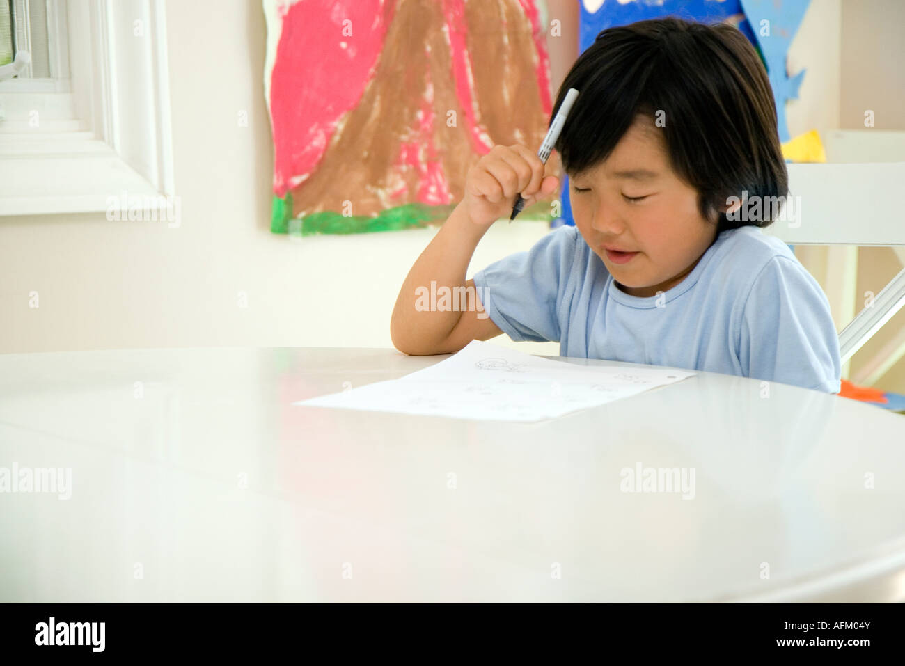 Young Boy Frustrated with his Homework Stock Photo - Alamy