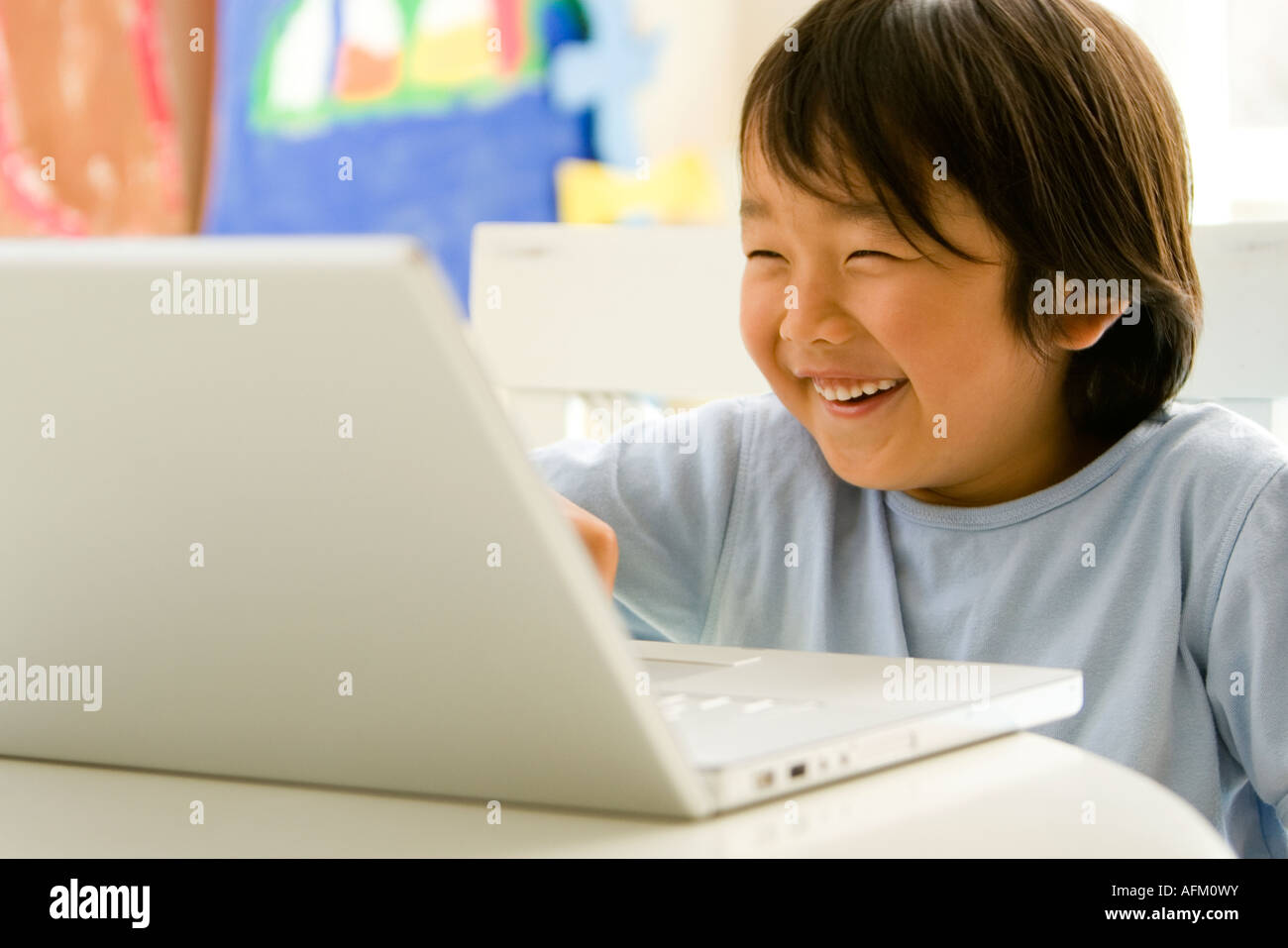 Young Boy on Computer Stock Photo - Alamy