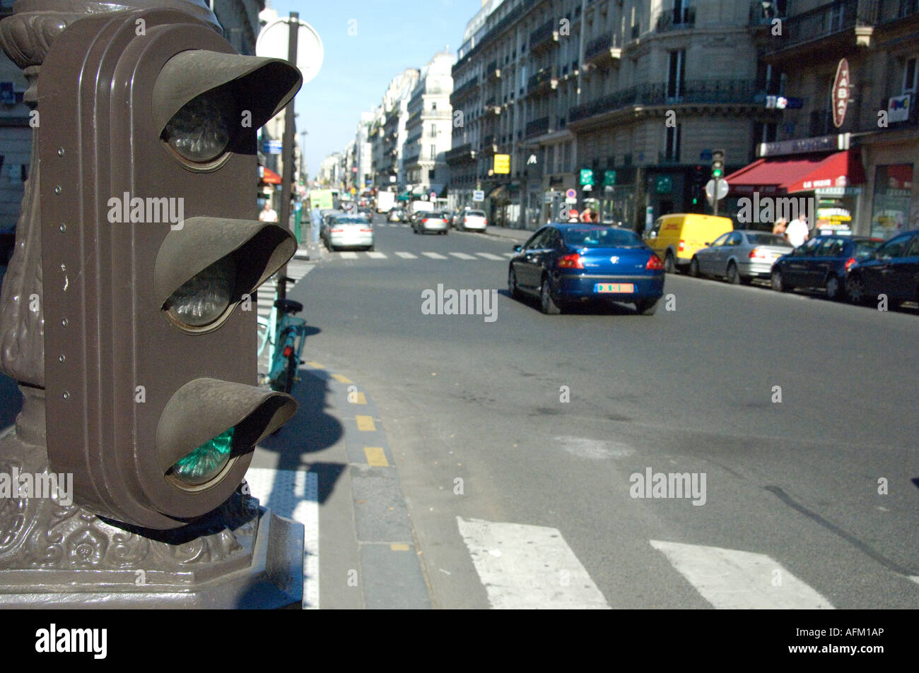 green traffic light signal on paris street Stock Photo - Alamy