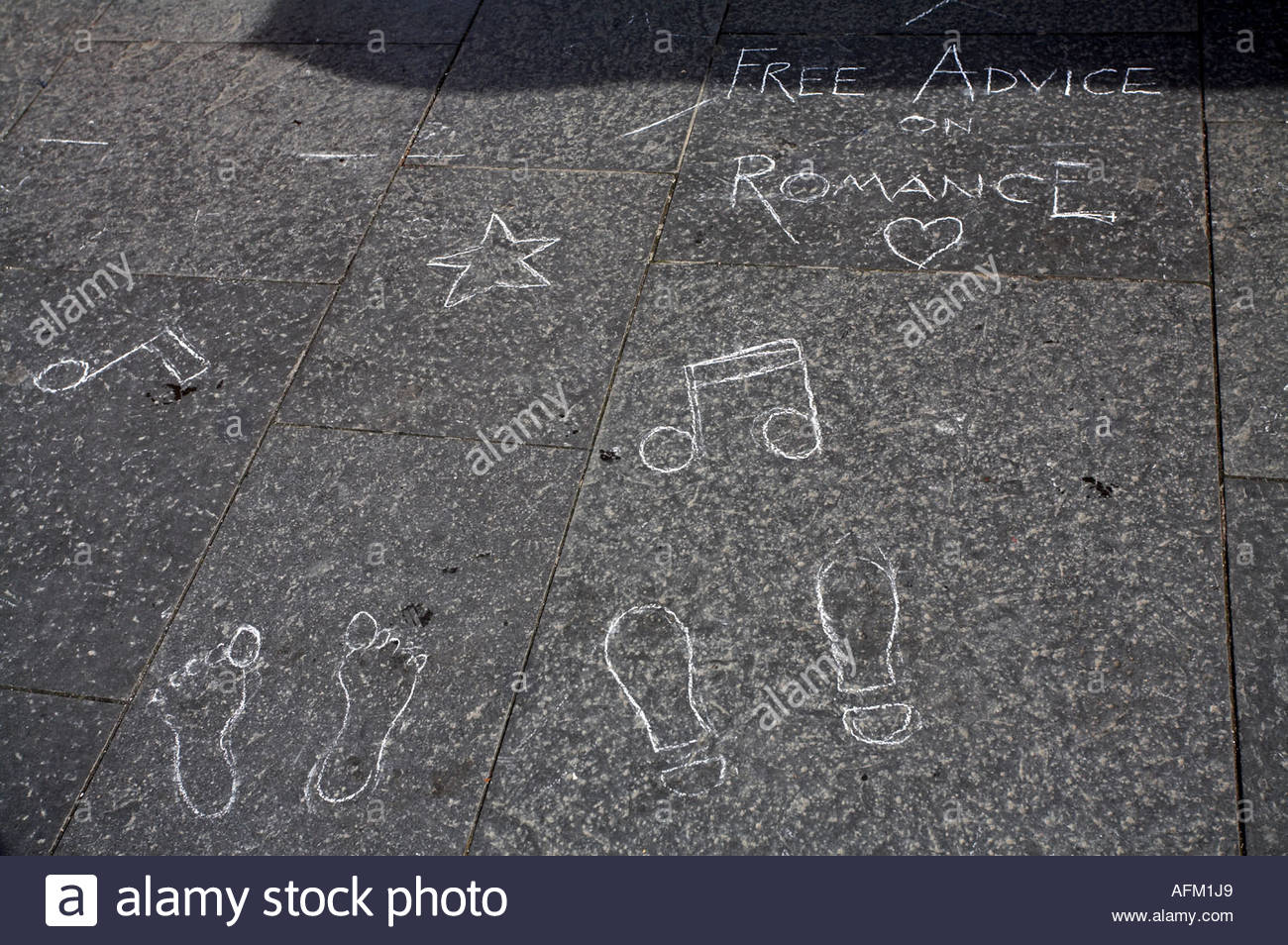 Street art on a pavement Stock Photo - Alamy