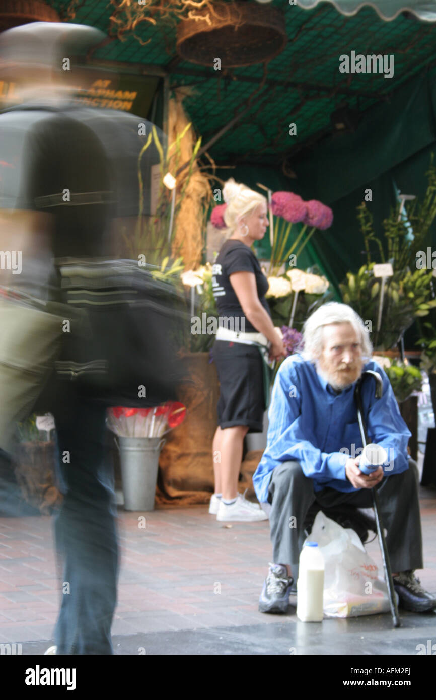 Homeless person begging crowd hi-res stock photography and images - Alamy