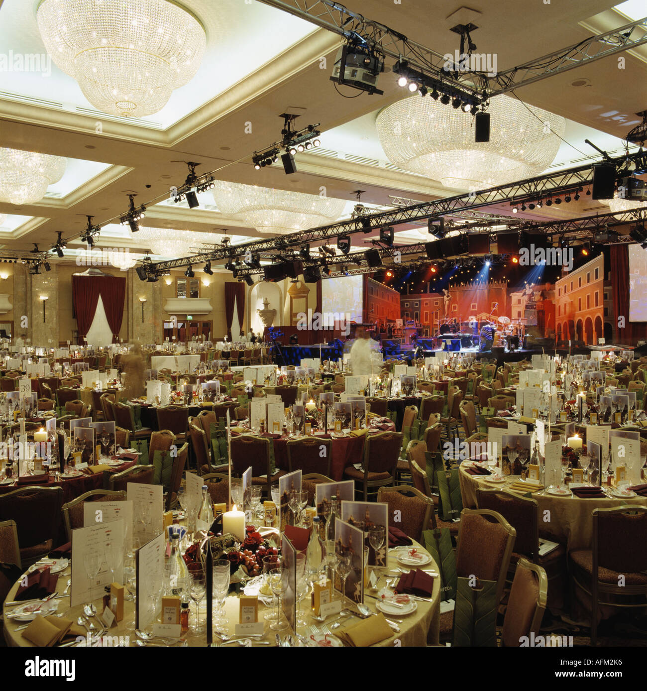 Tables set for celebratory event dinner in hotel dining room Stock ...