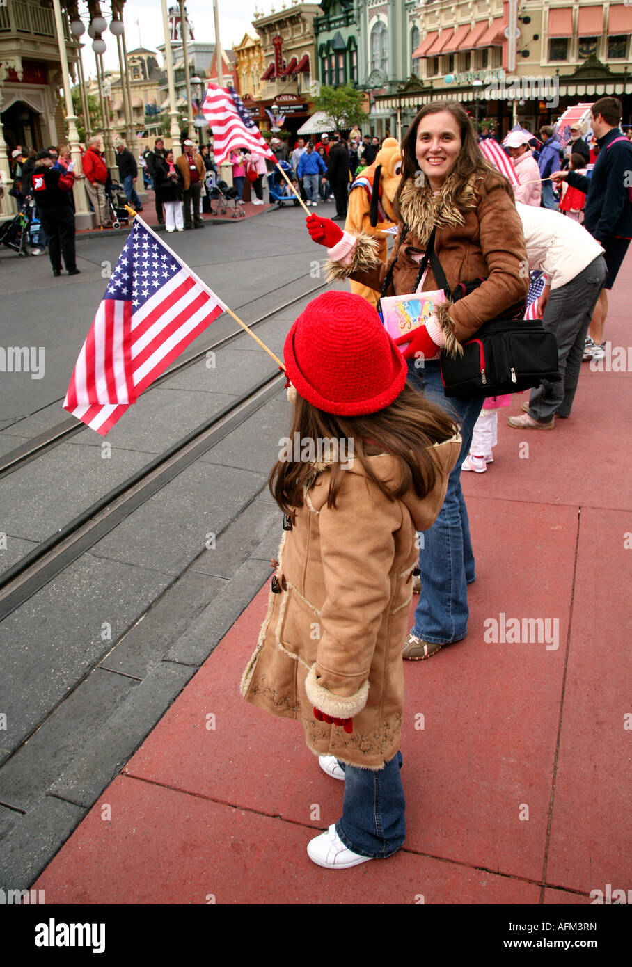 People cheering on an afternoon parade at Magic Kingdom wavin united ...