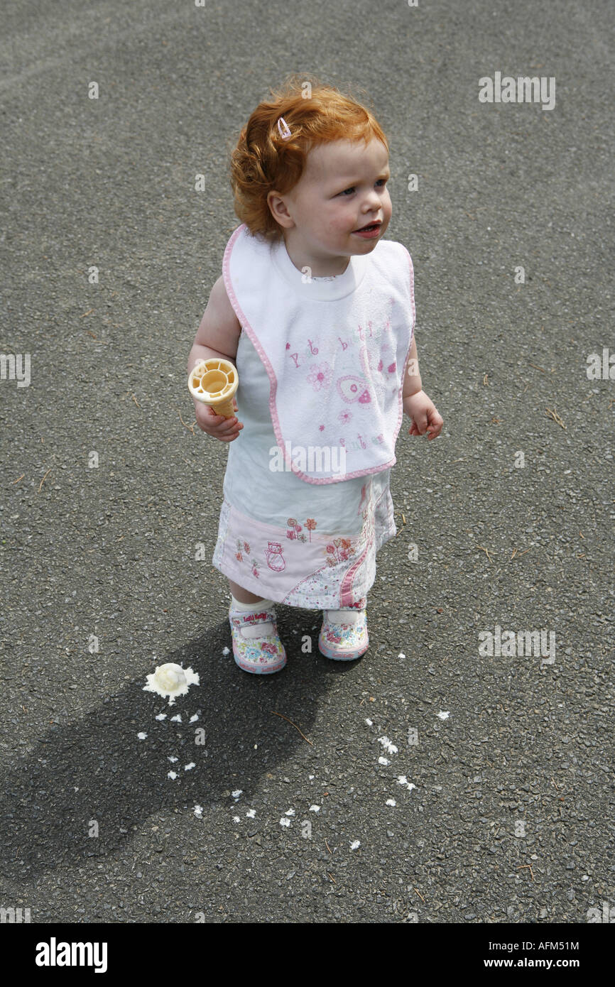Little girl with her ice cream that has dropped on the floor Stock ...