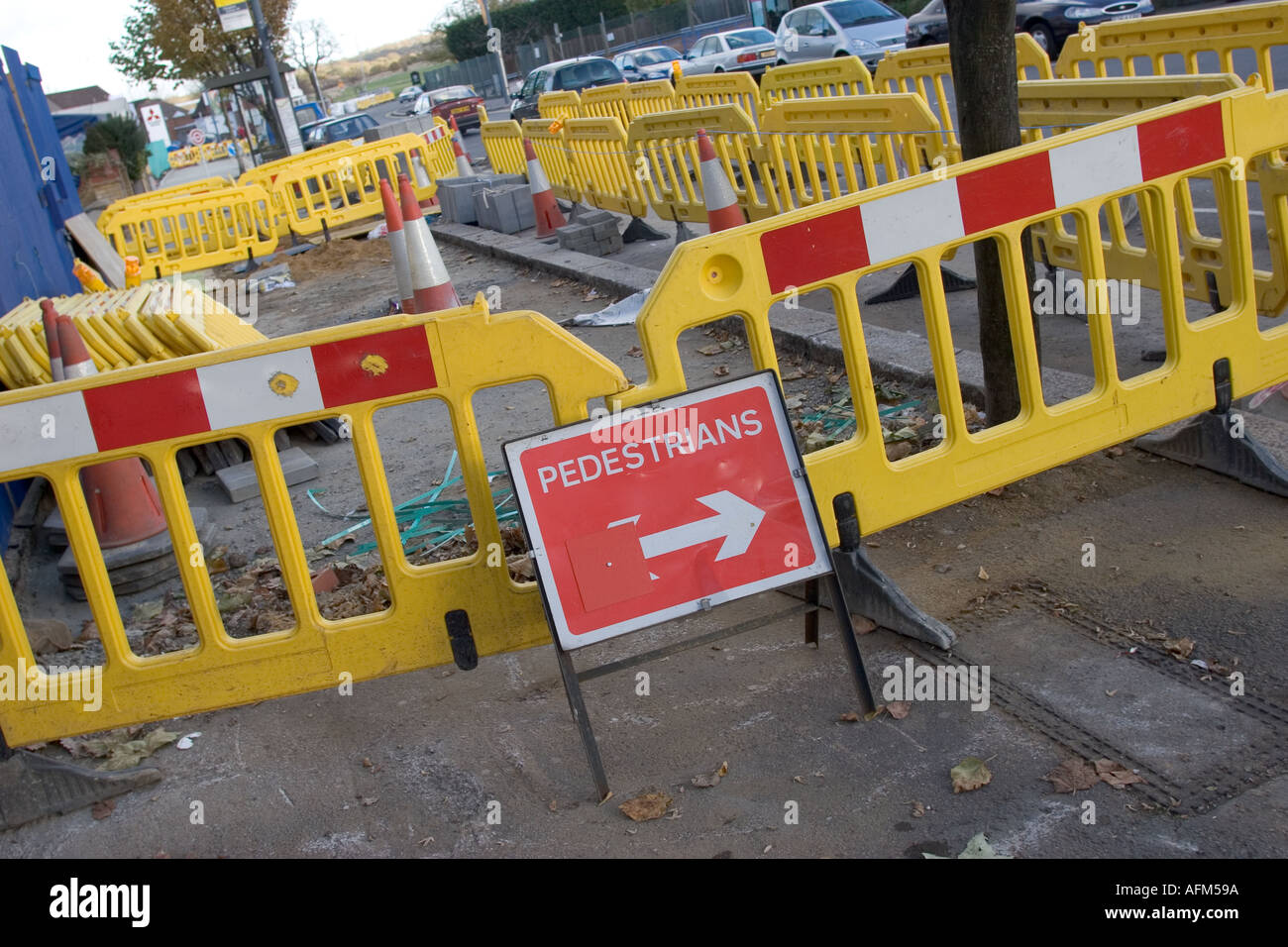 Pavement blocked by works - pedestrians Stock Photo - Alamy