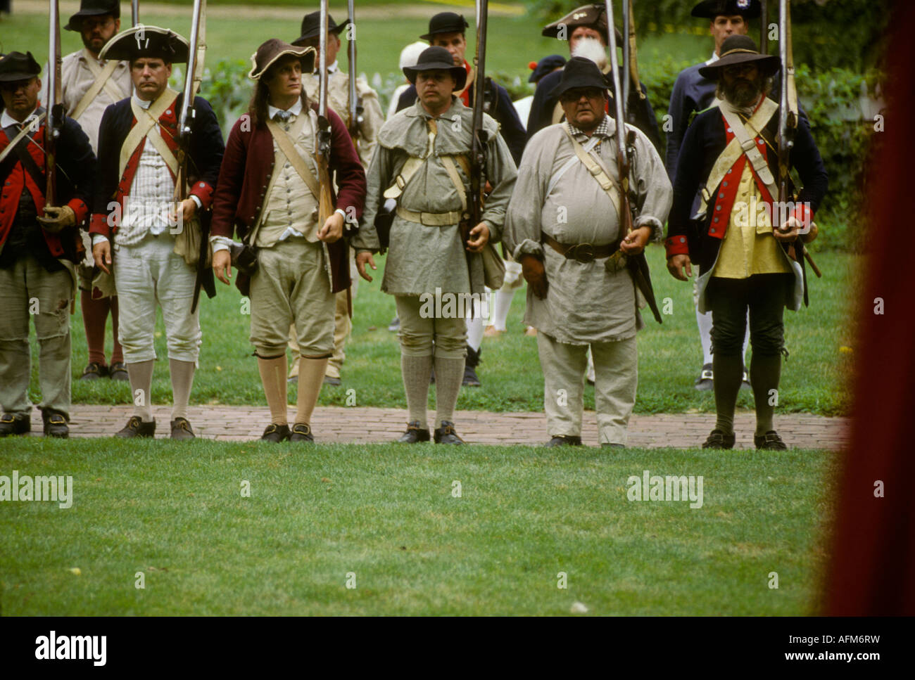American revolutionary war reenactors prepare for mock combat at Edward ...