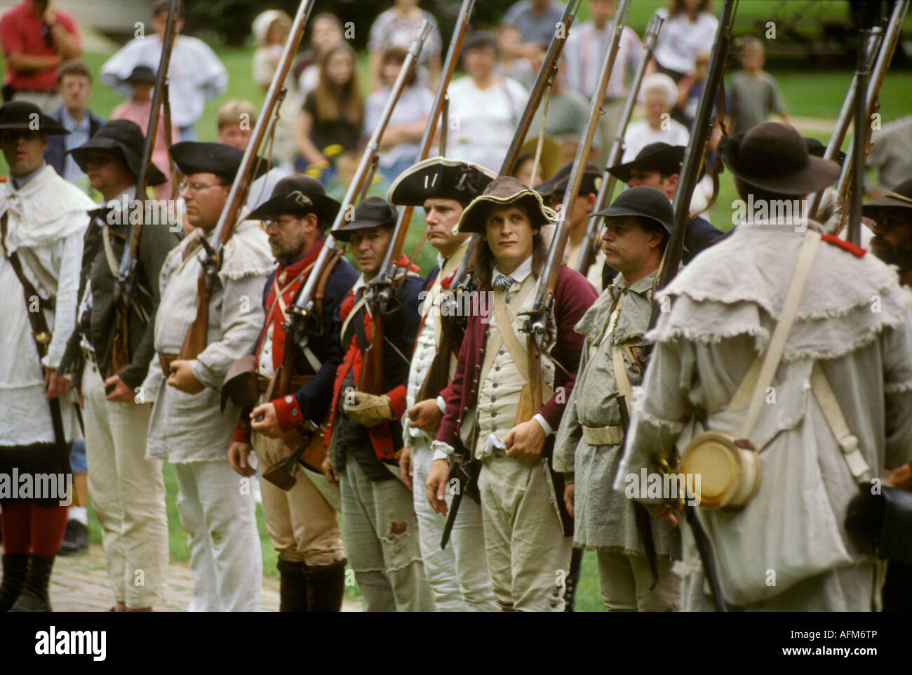 American revolutionary war reenactors prepare for mock combat at Edward ...