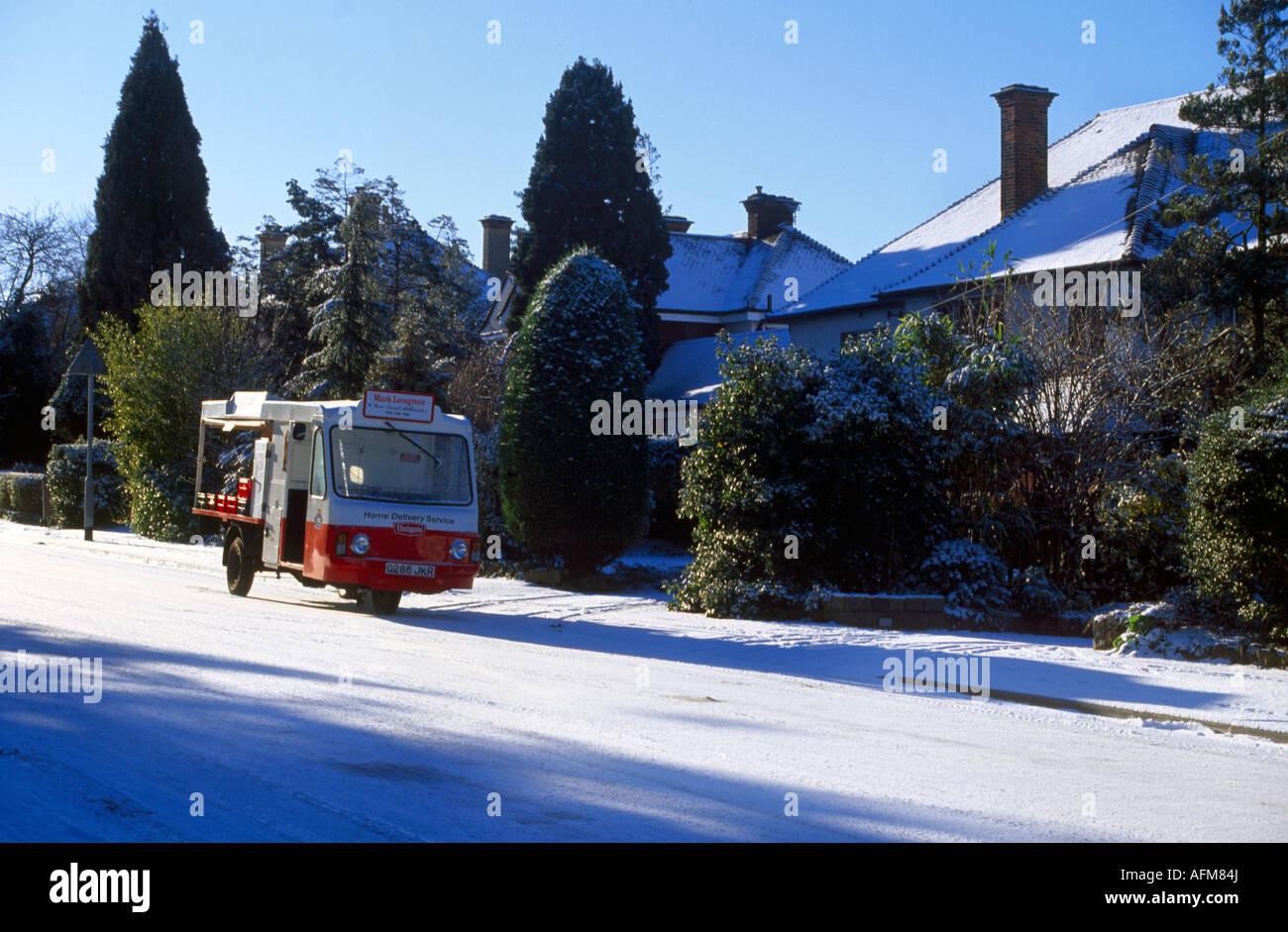 Milk Float On Snowy Road Cheam Surrey England Stock Photo - Alamy