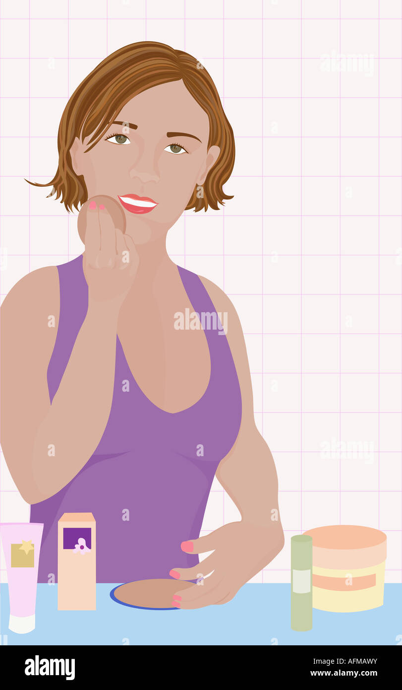 Woman putting face powder on her face Stock Photo - Alamy