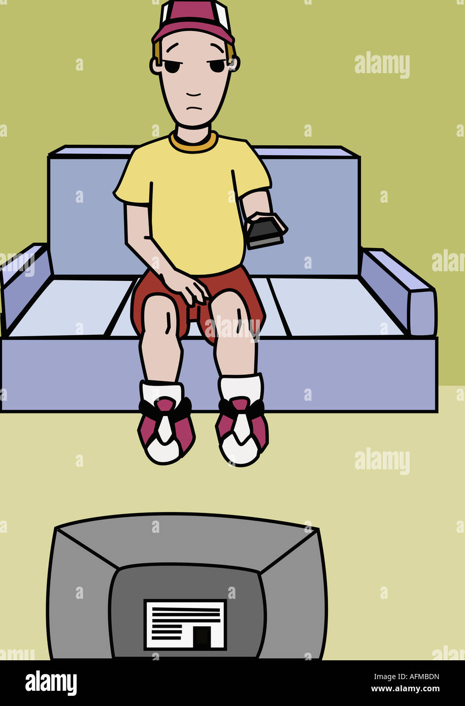 Boy sitting on a couch and watching television Stock Photo - Alamy