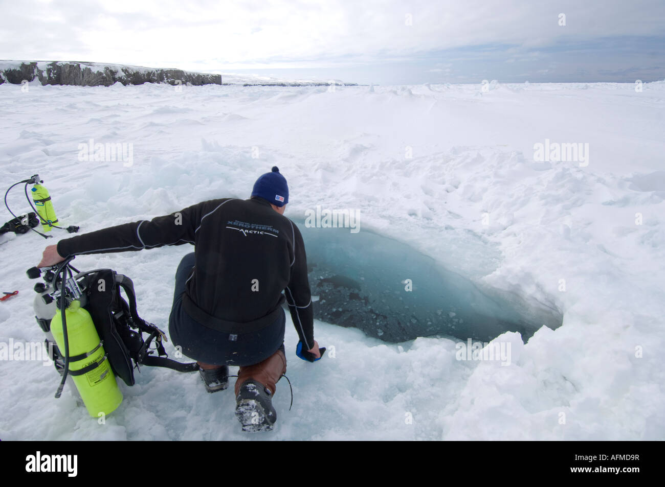 Austrian dive tourist Peter prepares for a dive into an Arctic crack in ...