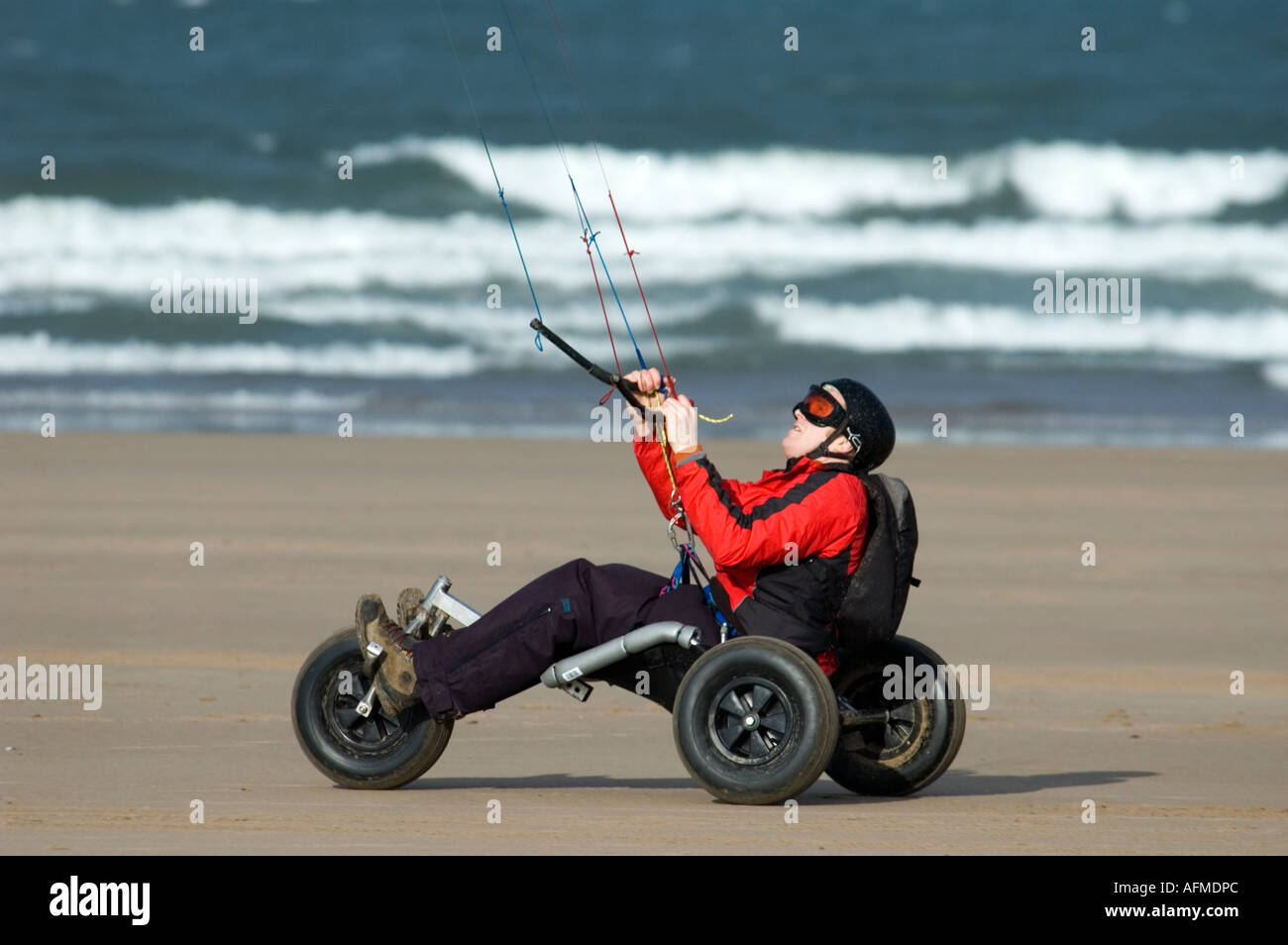 A parakite on the beach at John Muir Country Park Scotland Stock Photo ...