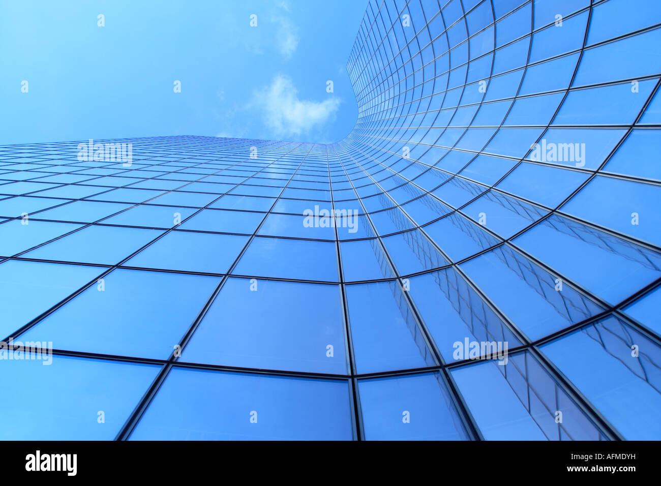 Blue glass front of a high-rise building Stock Photo - Alamy