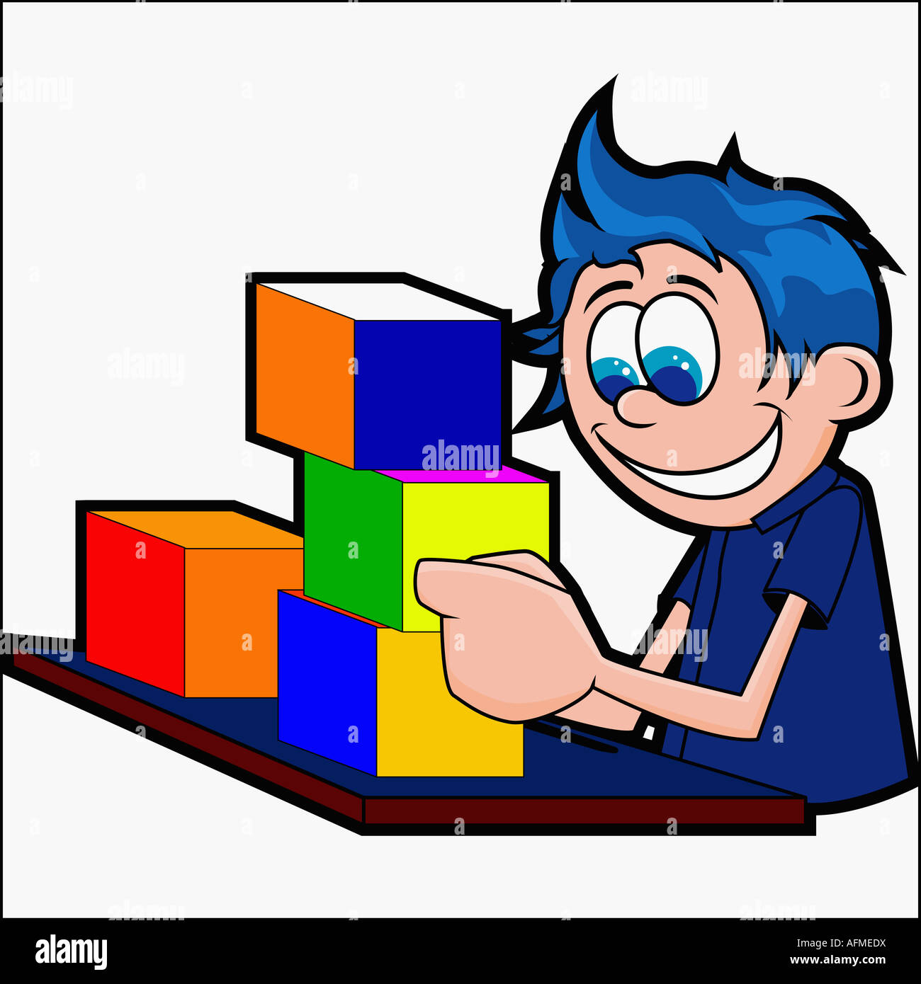 Boy playing with colored blocks Stock Photo - Alamy