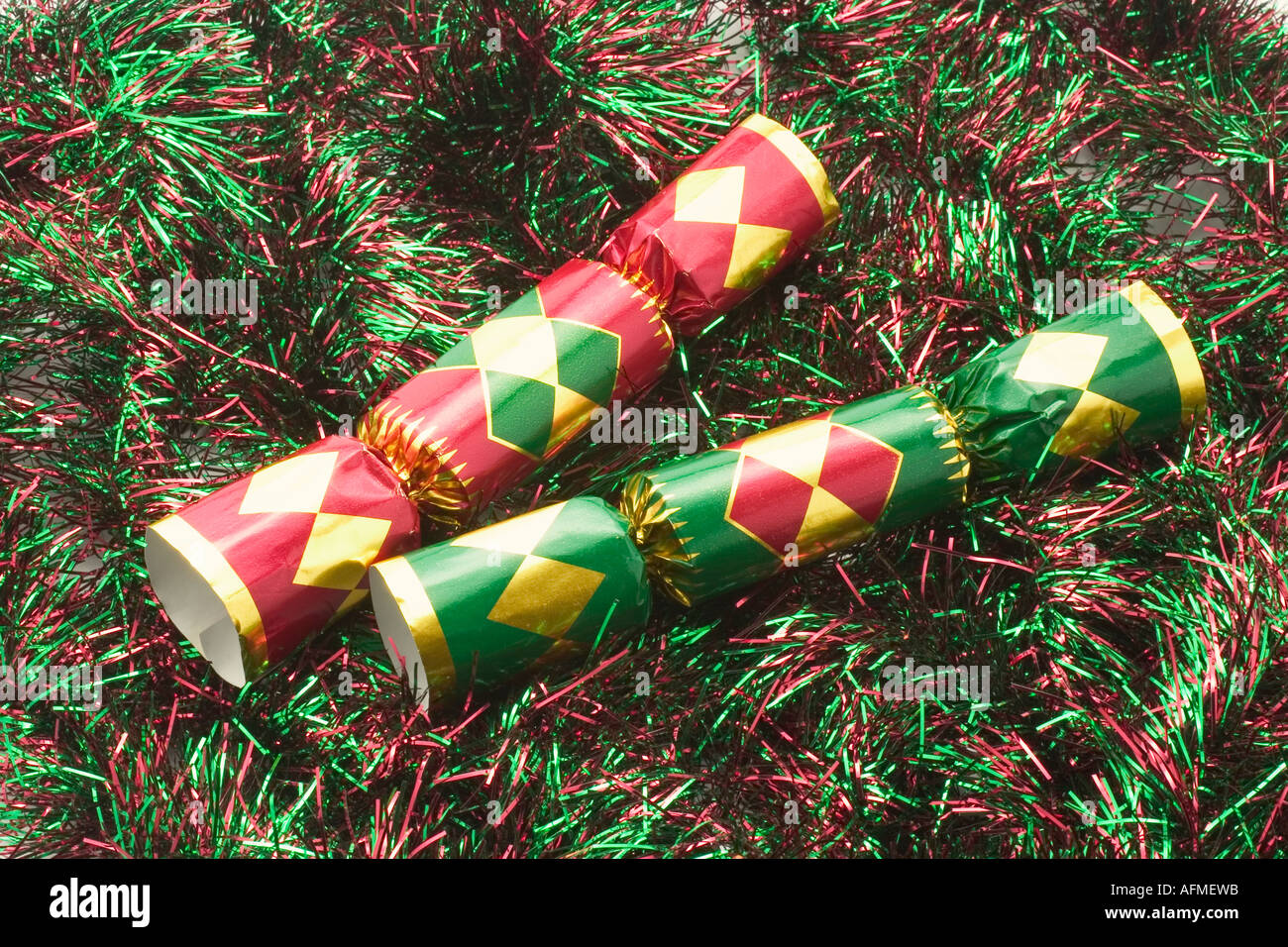 Christmas Crackers and Tinsels Stock Photo - Alamy
