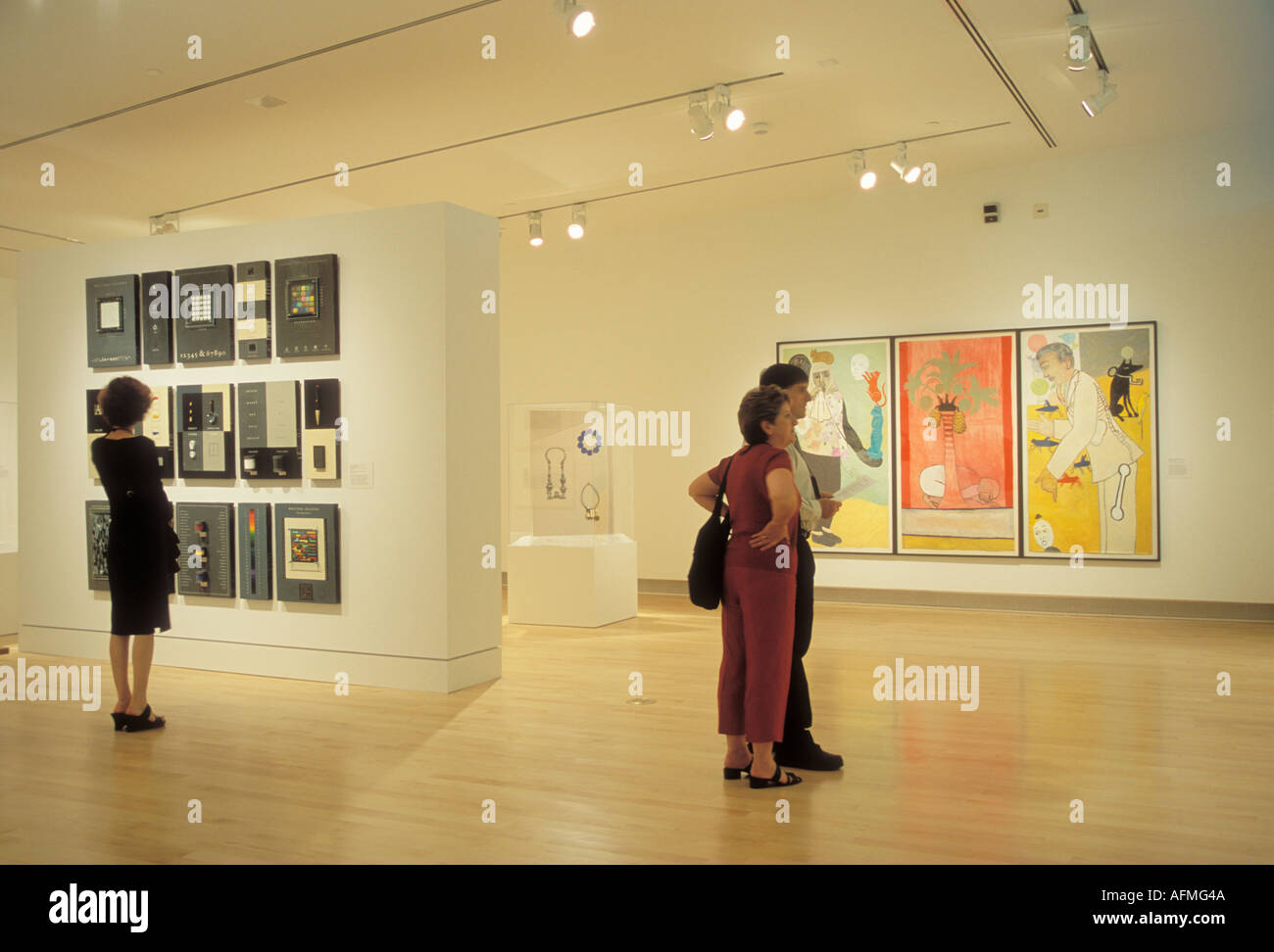 Visitors viewing contemporary art exhibit at the Tacoma Art Museum ...
