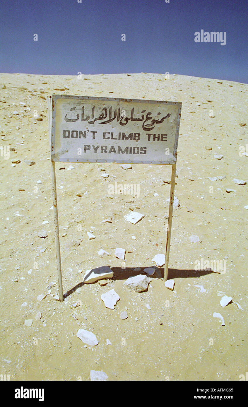 A warning sign beneath the pyramids at Giza Stock Photo - Alamy