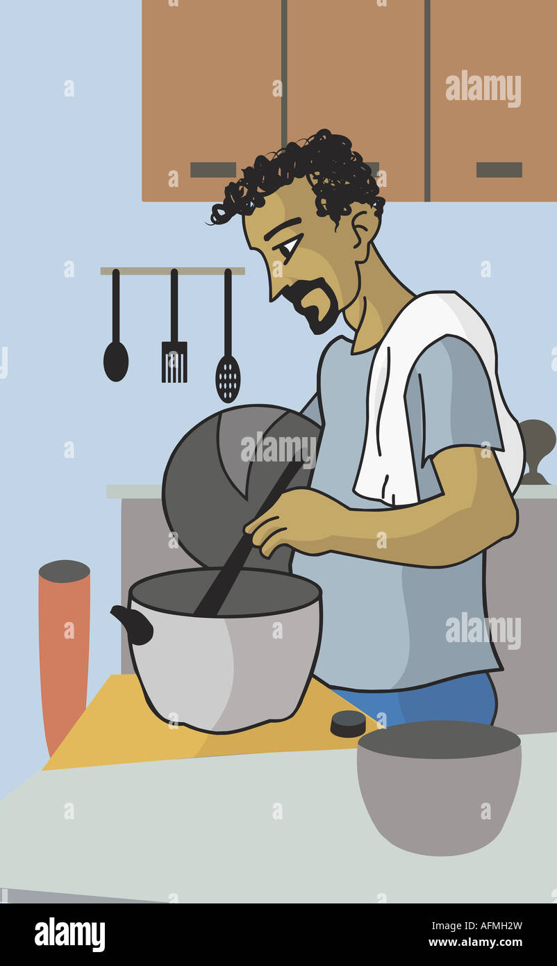 Man cooking in the kitchen Stock Photo - Alamy