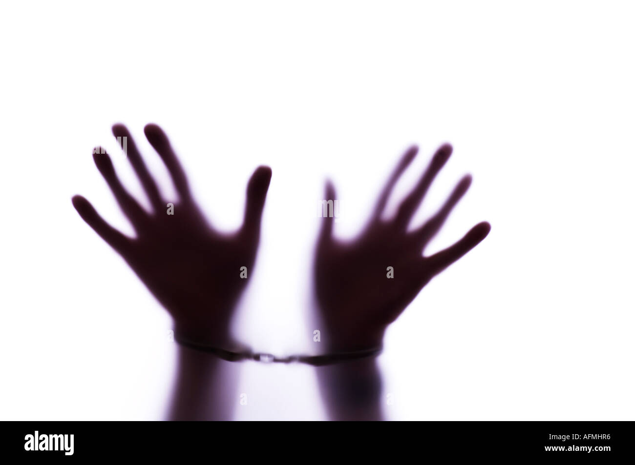 Shackled hands hi-res stock photography and images - Alamy