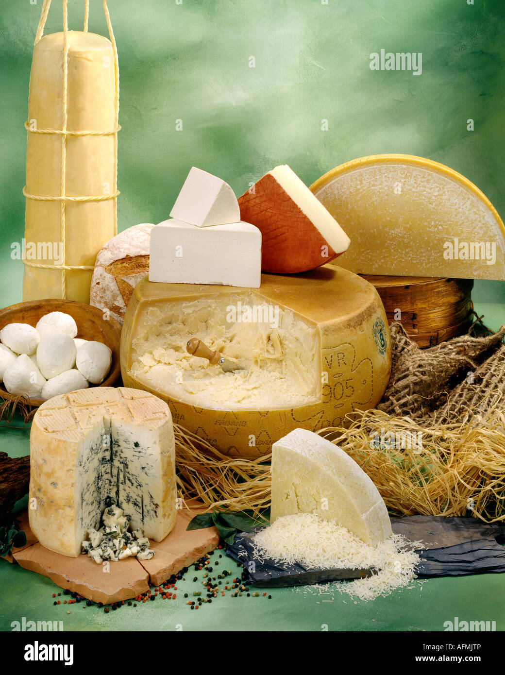 Italian Cheeses in group color photograph on green toned mottled ...