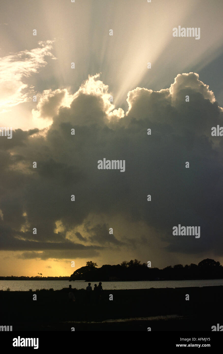 India Kerala Cochin stormy sky with rays of light Stock Photo - Alamy
