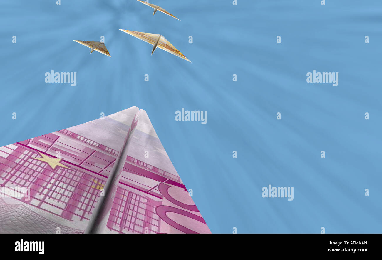 Bank notes in the shape of airplanes flying in the sky Stock Photo - Alamy