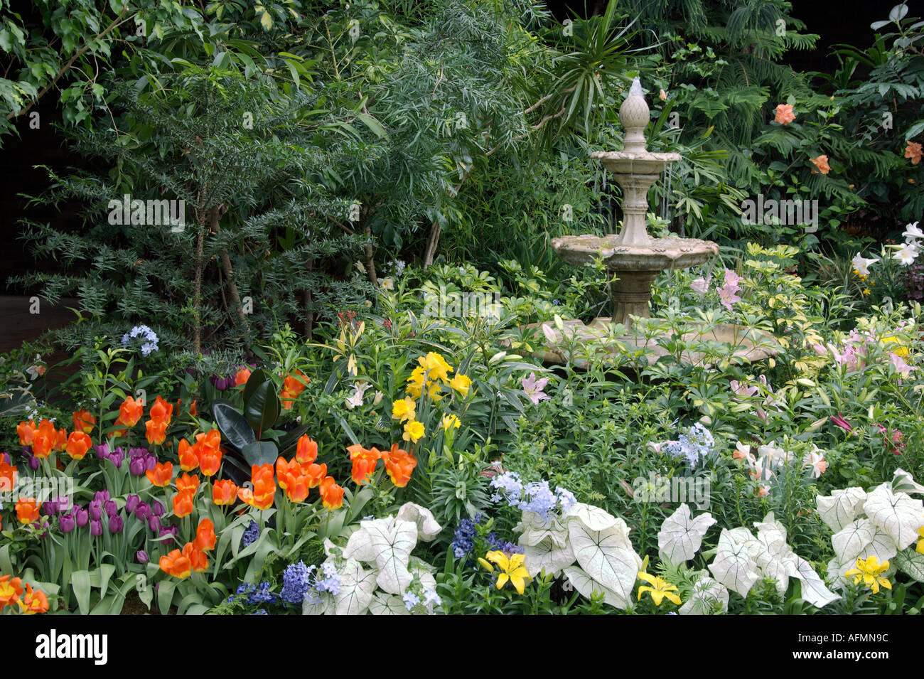 Indoor spring flower garden at the Conservatory of the Assiniboine Park ...