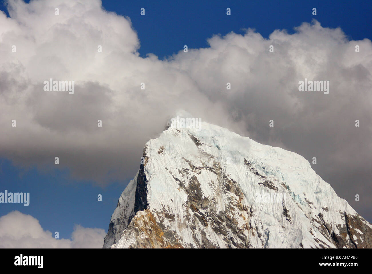Lofty peak near the Nepali Himalayan village of Gokyo surrounded by ...