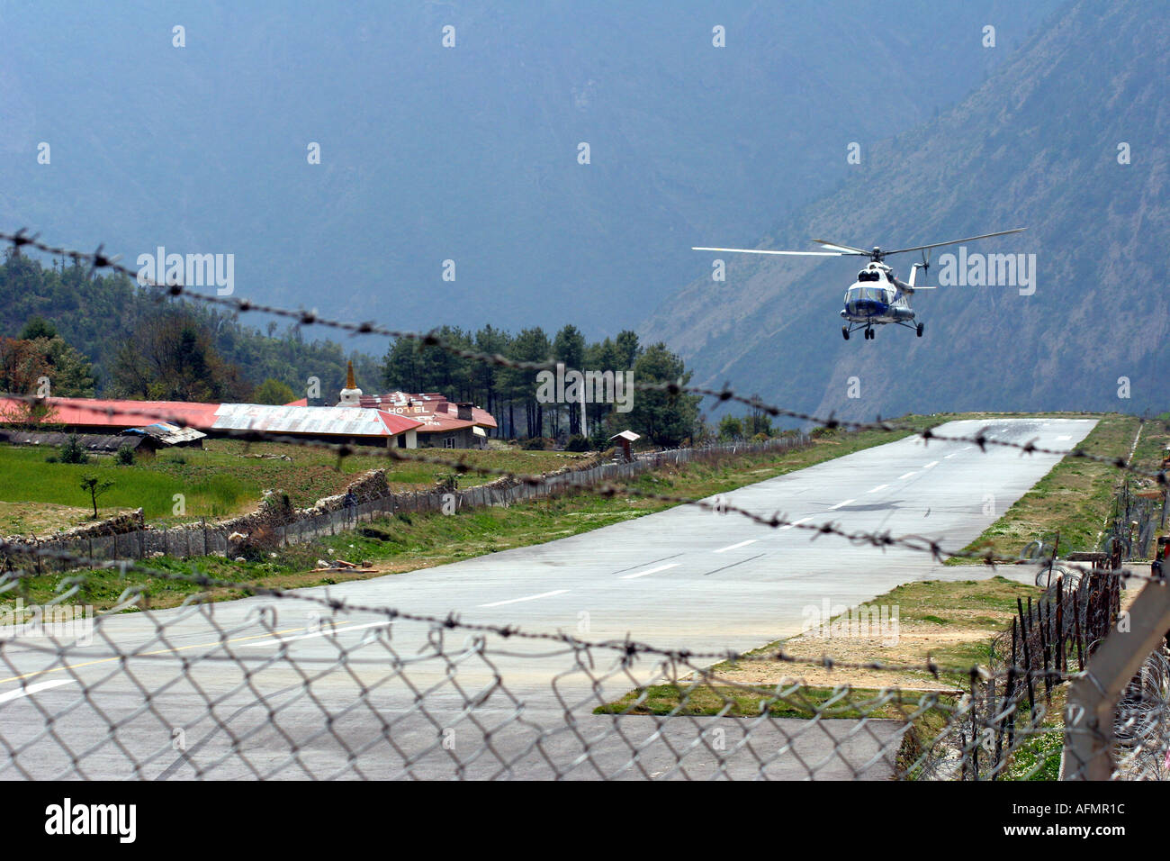 Cargo helicopter landing at Lukla Airport which is the entry point for ...