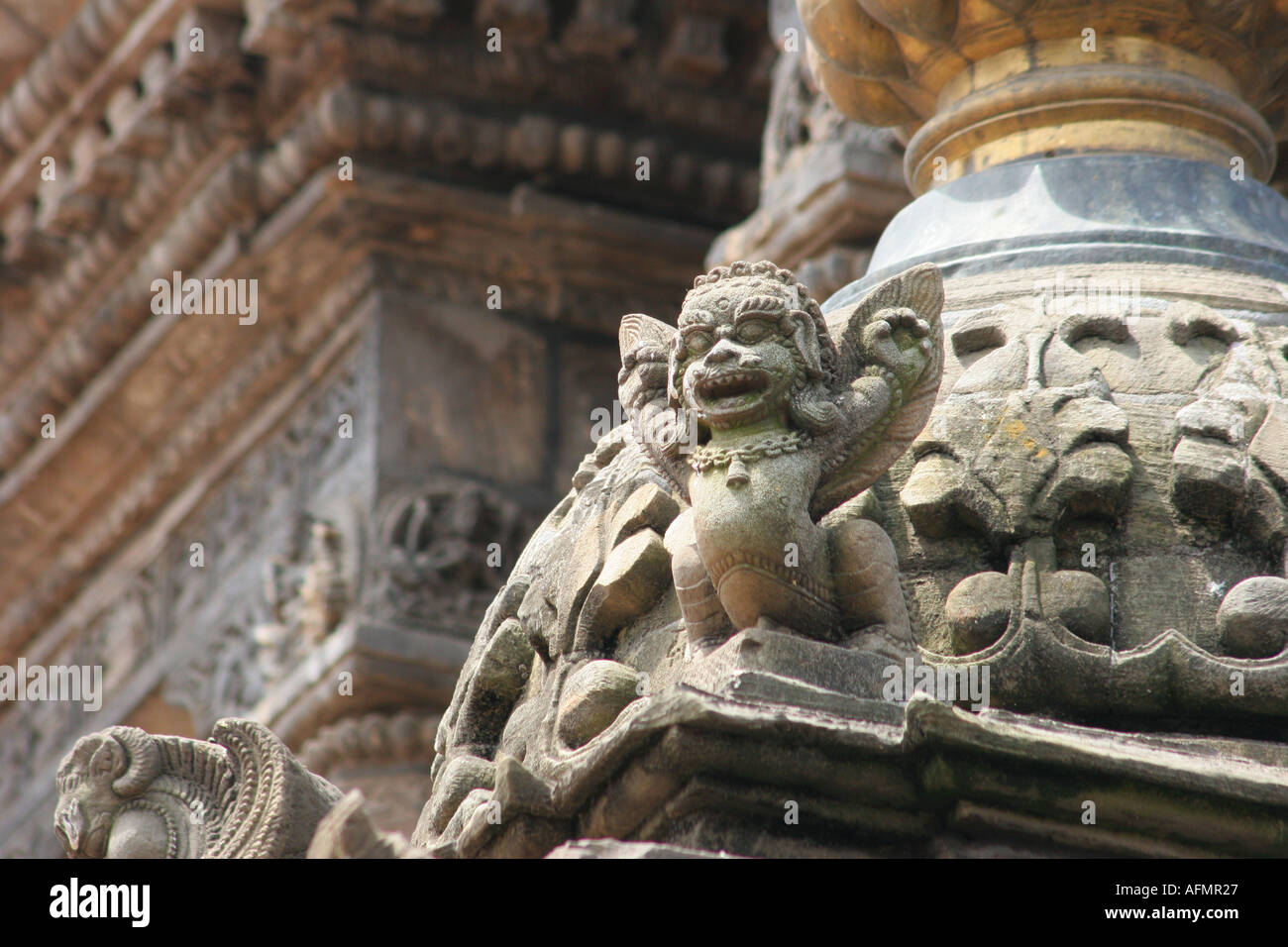 Batlike guardian creature sculpture in the preserved old town square of ...