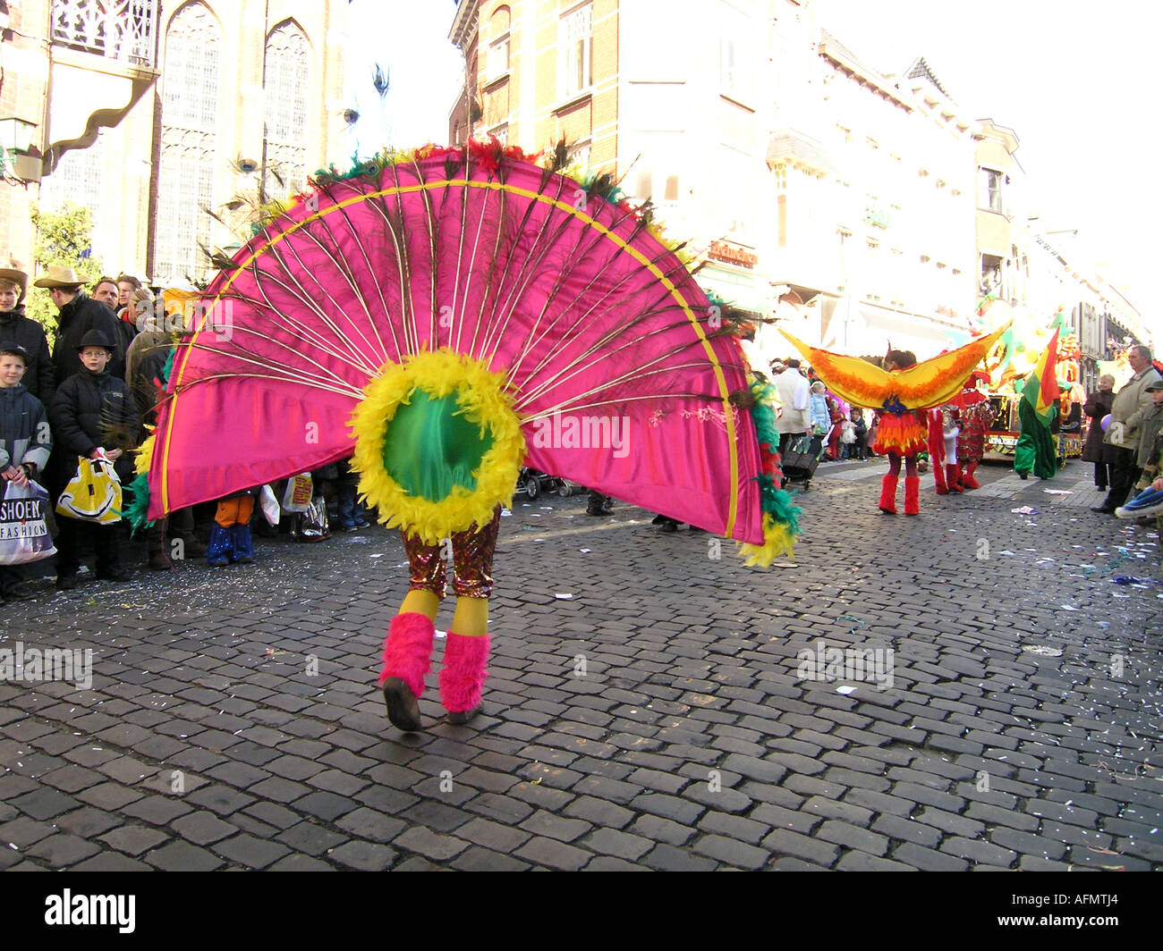 solitary Dutch Carnival participant in parade with colourful home made ...