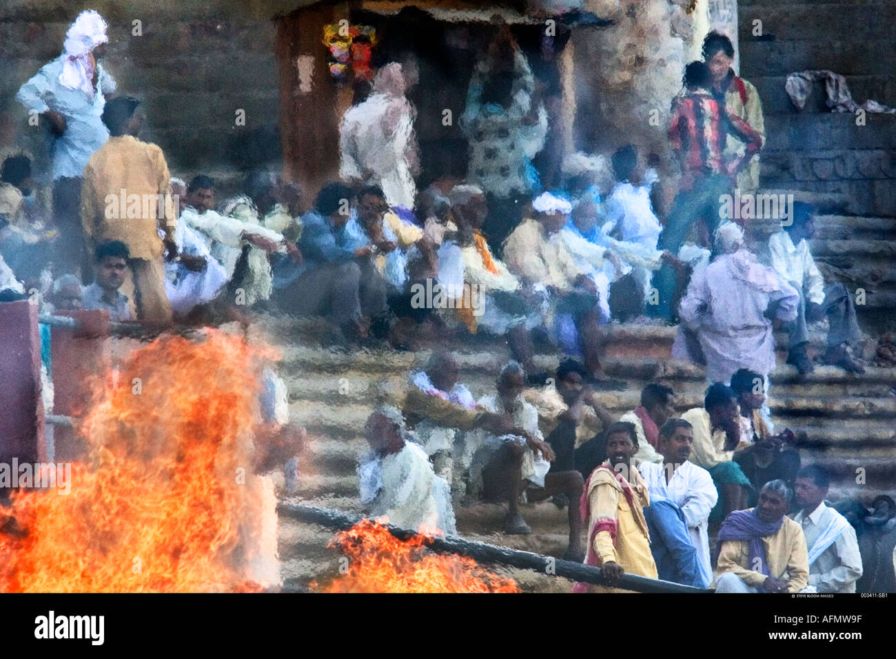 Crowds at a funeral pyre on the banks of the Ganges Varanasi India ...