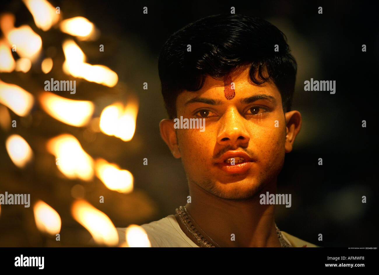 Hindu holy man performing religious ceremony puja Varanasi India Stock ...