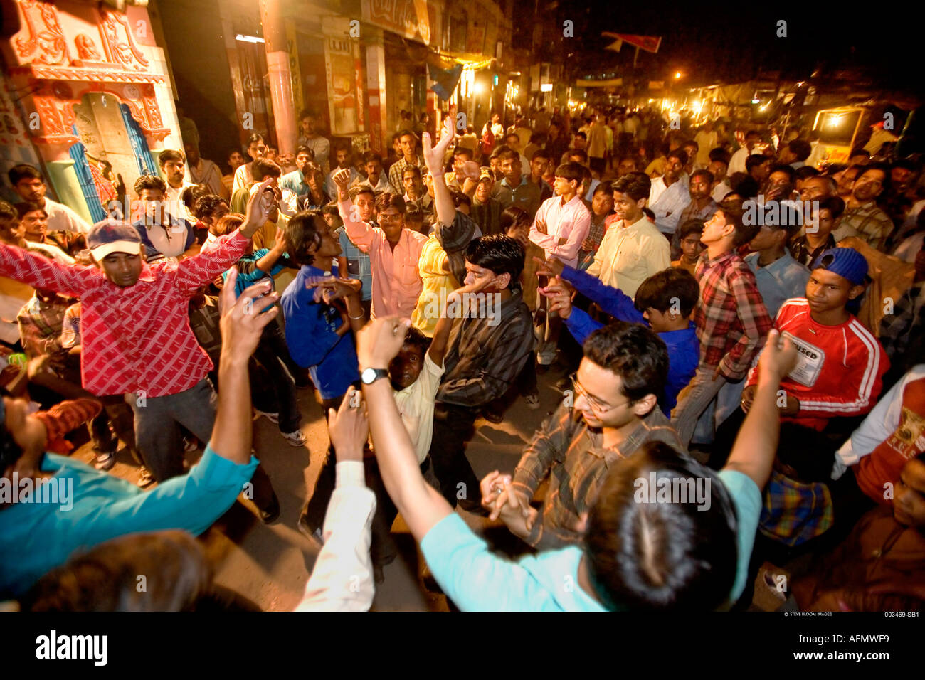 Street scene at night Varanasi India Stock Photo - Alamy
