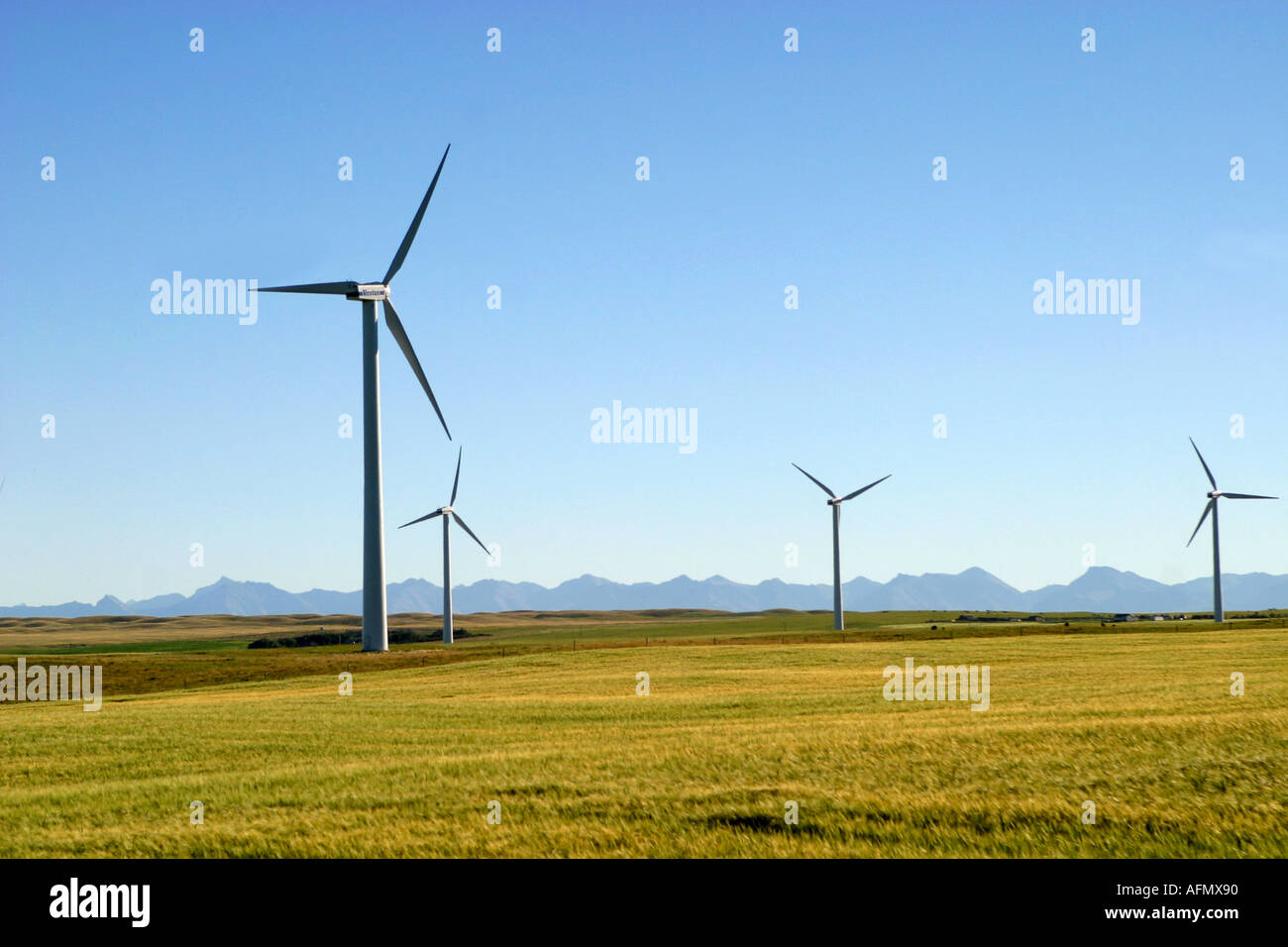 Wind farms harnessing the wind Stock Photo - Alamy