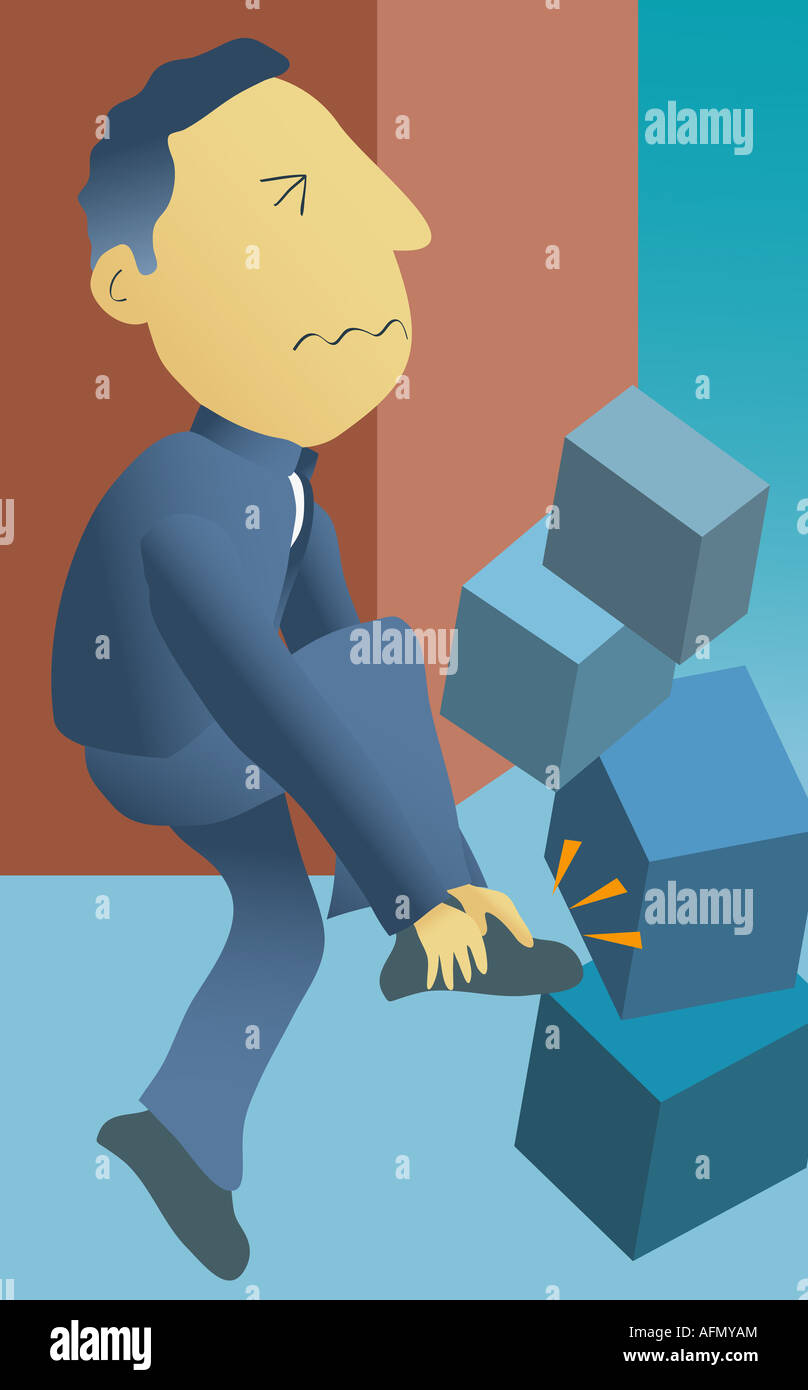 Businessman touching his injured foot Stock Photo - Alamy