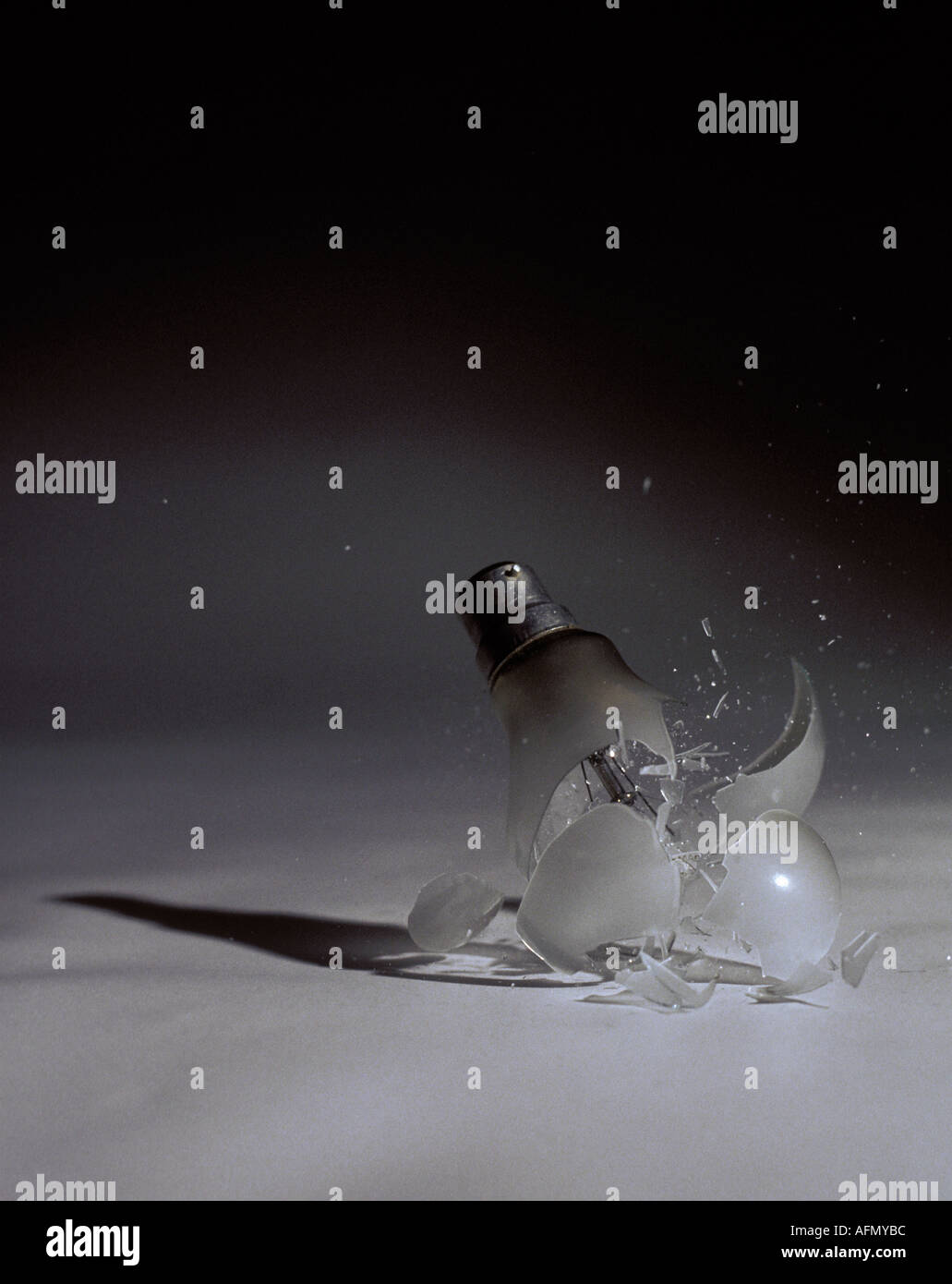 High speed photography showing a dropped light bulb smashing as it hits ...
