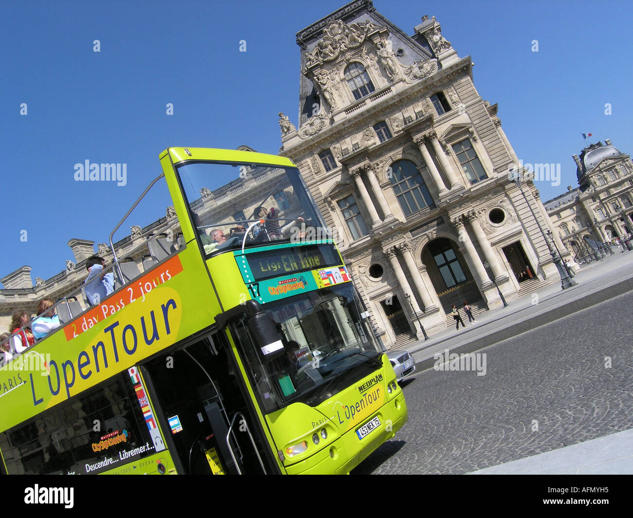 Open air sight seeing bus parked at Louvre Paris France Stock Photo - Alamy