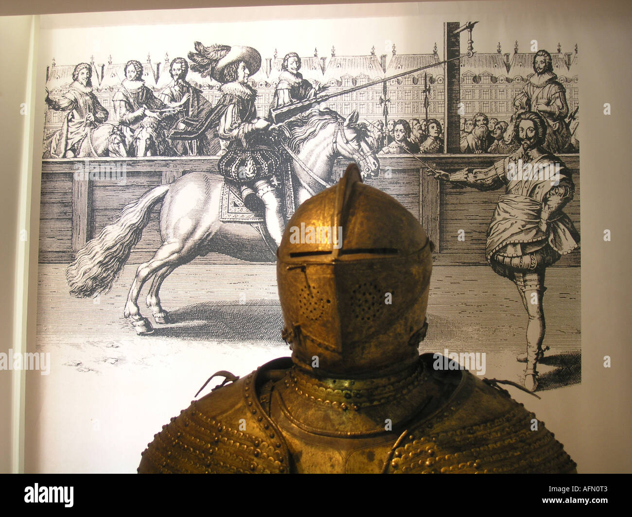 Detail of armour clad suit with illustration of French war scene behind ...
