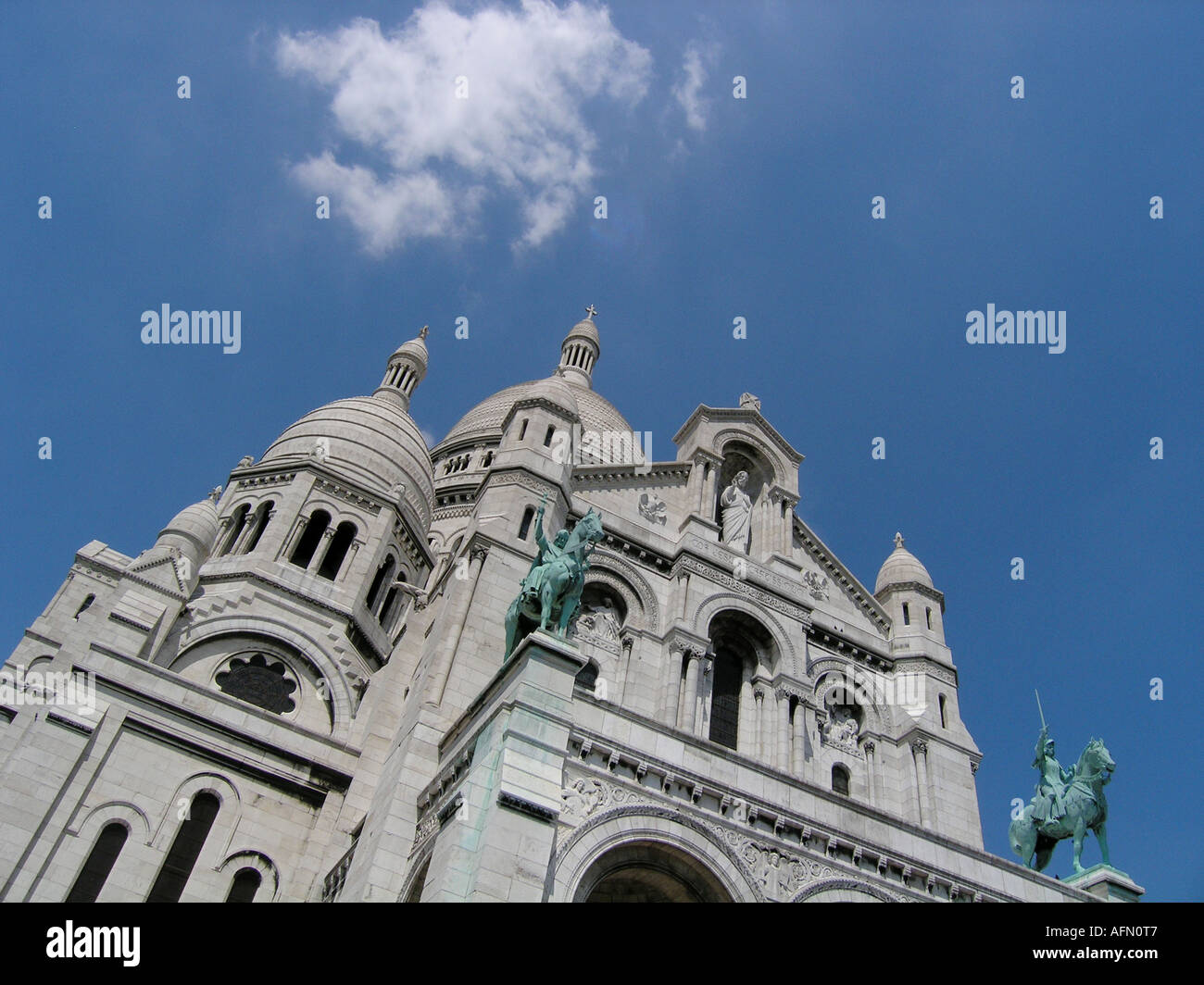 Slanting view in frog eye perspective of Sacre Coeur Montmartre Paris ...