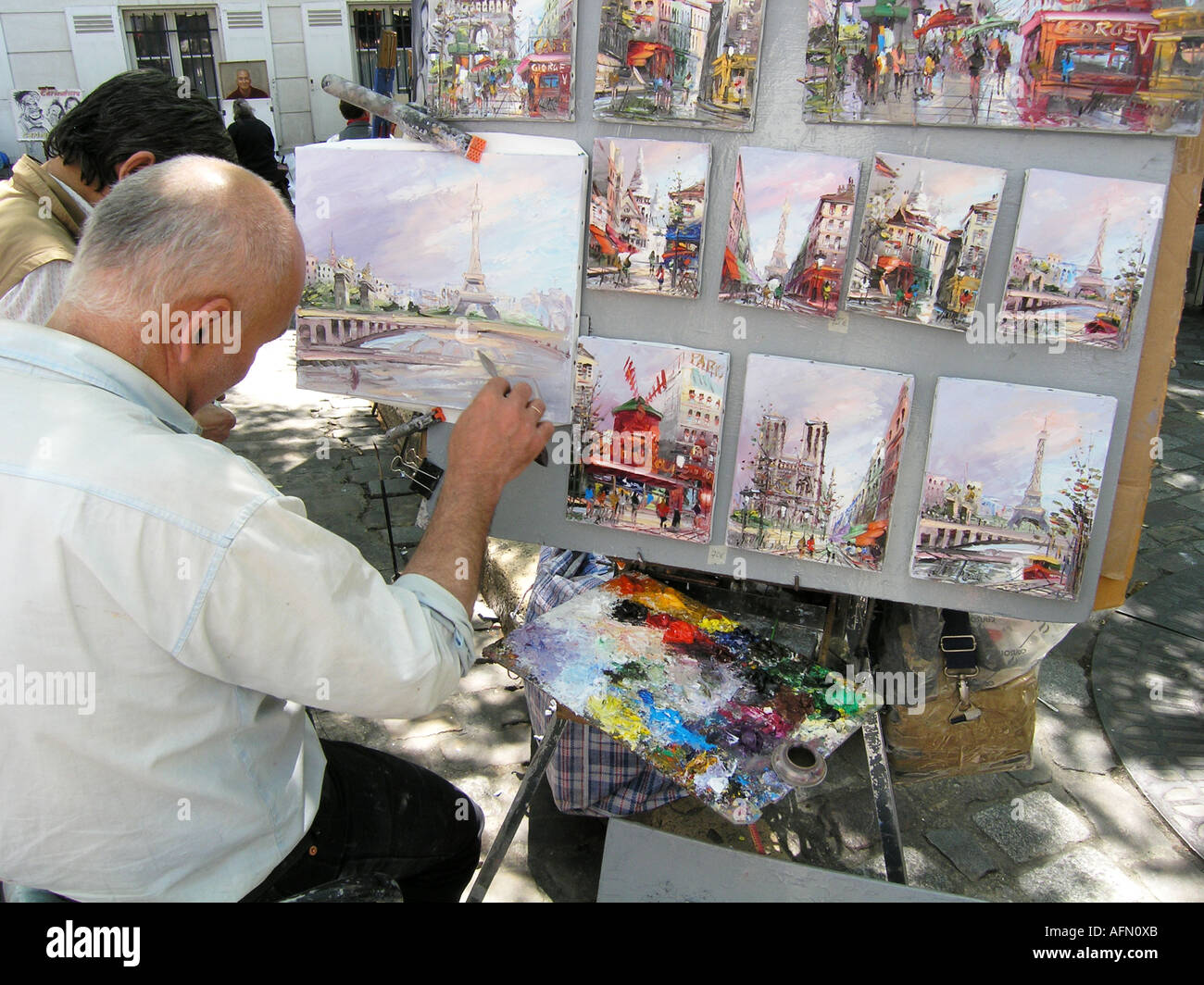 Painter at work in Place du Tertre Montmartre Paris France Stock Photo ...