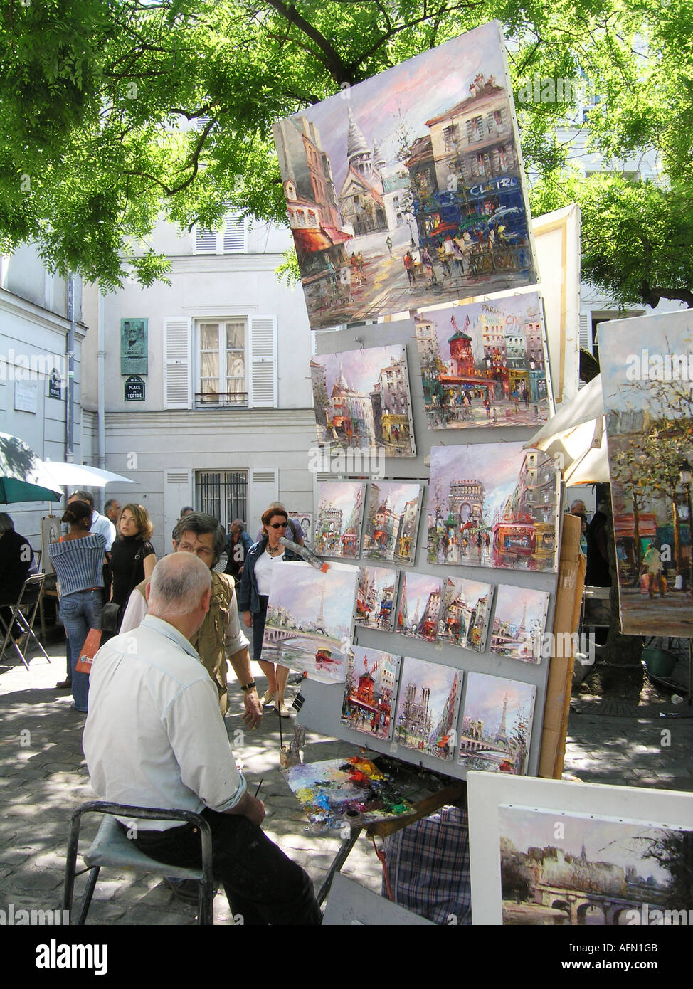 Painter at work in Place du Tertre Montmartre Paris France Stock Photo ...