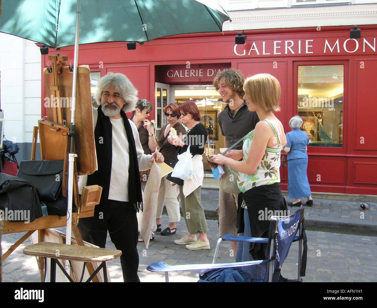 Painter at work in Place du Tertre Montmartre Paris France Stock Photo ...