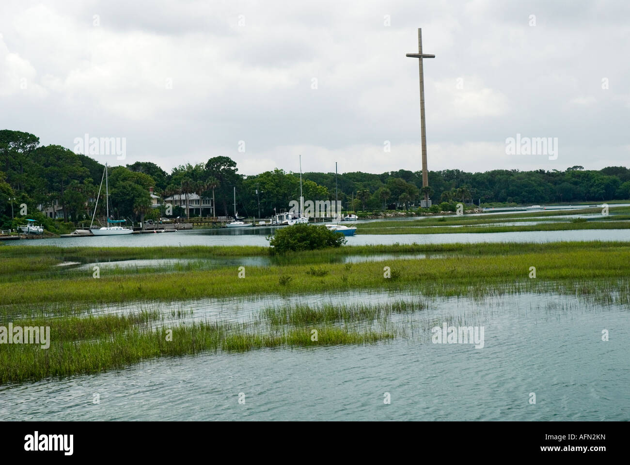 Matanzas Bay marshlands with 208 foot high cross of Mission Nombre de ...