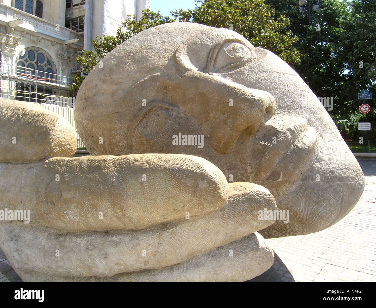 Close up of big stone head of L'Ecoute by Henri de Miller near Les ...
