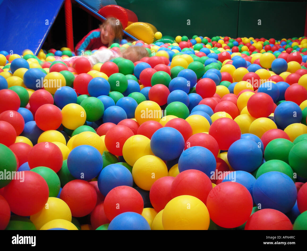 Framefilling image of colourful balls in ball pond Stock Photo - Alamy